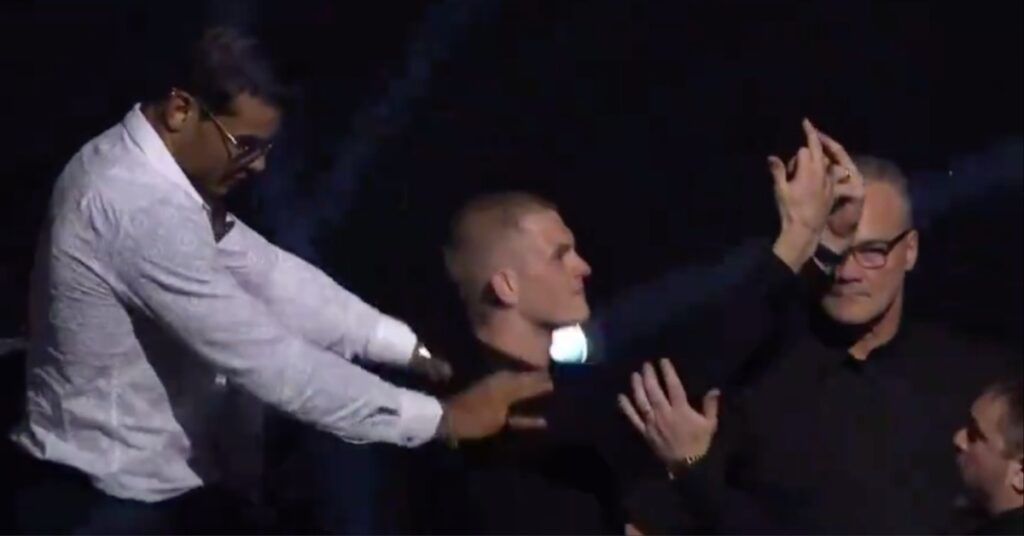 Video - Paulo Costa Pushes Ian Garry Off Stage After Flipping Off Fans ...